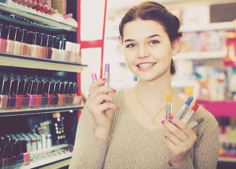 Female Customer Looking for Lipstick in Cosmetics Shop Stock Image ...