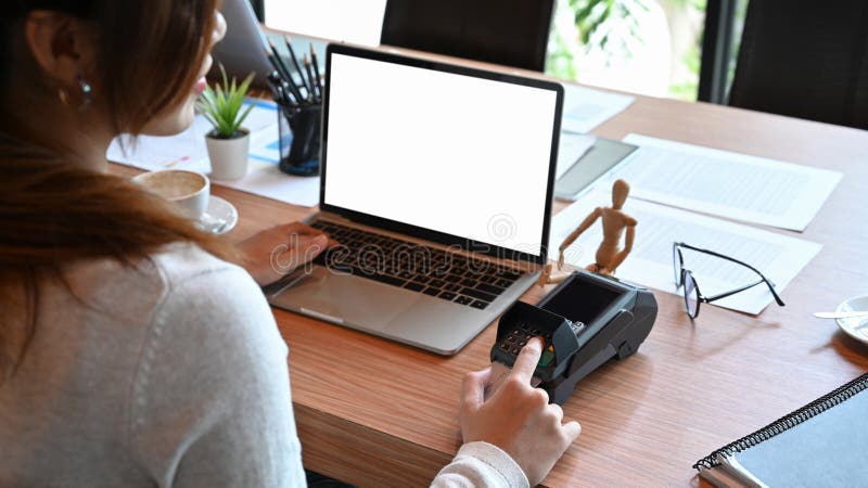 Customer Making Payment Using Credit Card in a Supermarket Stock Photo ...