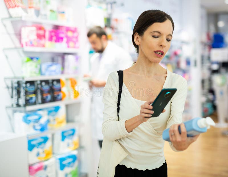 Female Customer Scans Barcode on a Medicine Box Using Phone Stock Image ...