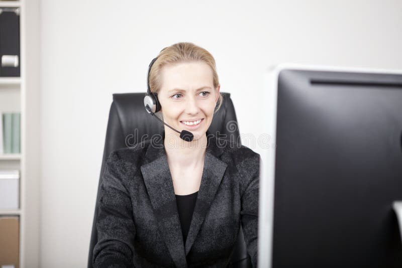 Female Customer Support Sitting at Her Office Stock Image - Image of ...