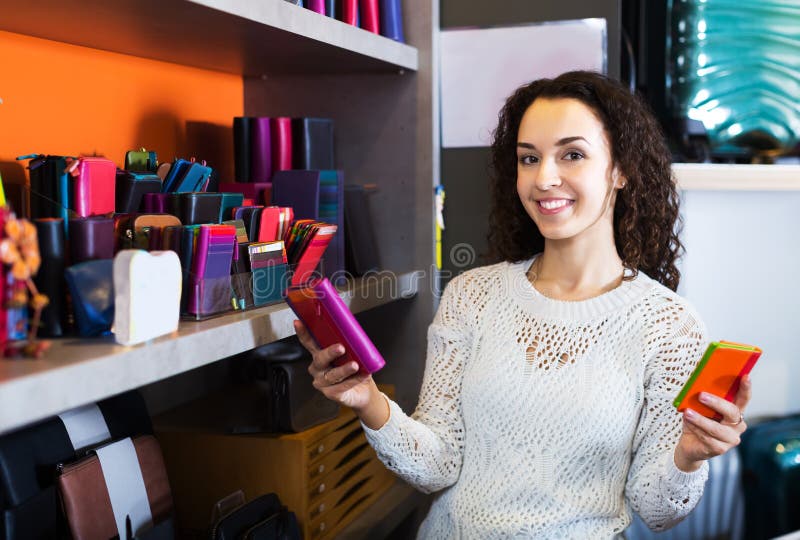 Female Customer Watching Leather Wallet Stock Photos - Free & Royalty ...