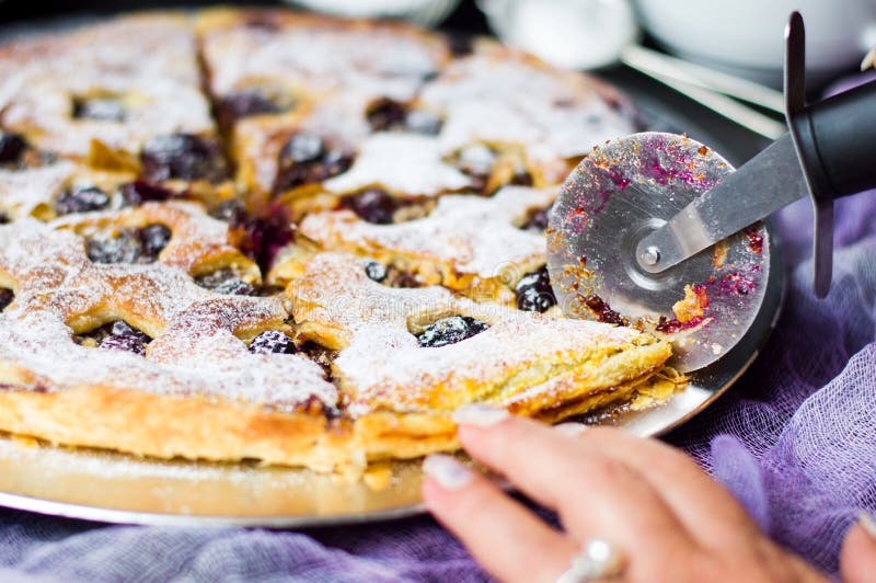 Female Cutting Sweet Pie with a Roller Cutter Stock Image - Image of ...