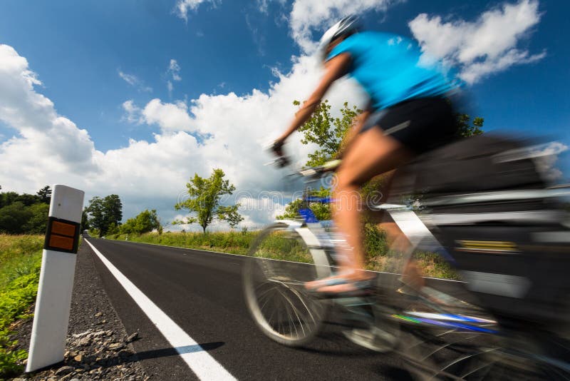 Cyclist on a Road Bike Going Fast Stock Photo - Image of athletic ...