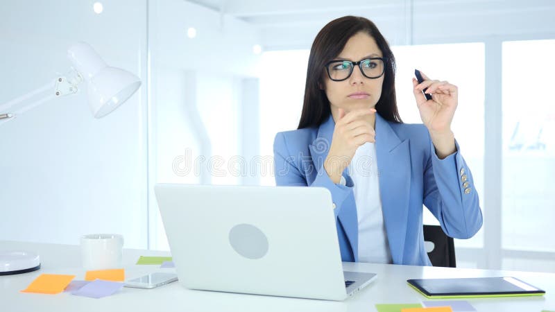 Female Designer Thinking about Next Work Plan, Brainstorming Stock ...