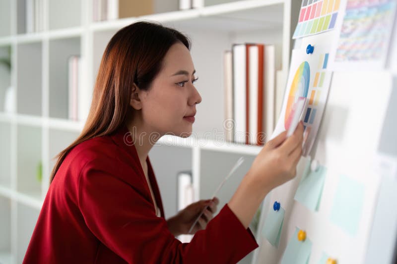 Creativity and Color Selection. a Designer Focuses on Color Palettes ...