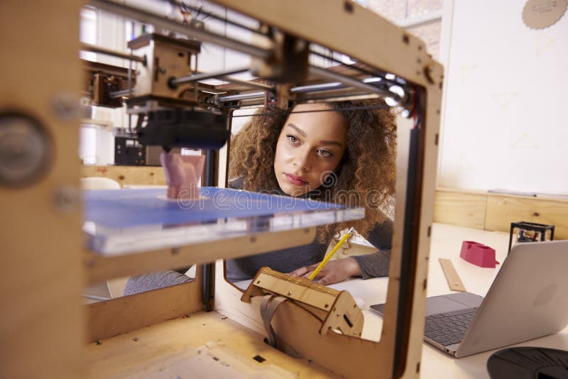 Female Designer Working with 3D Printer in Design Studio Stock Photo ...
