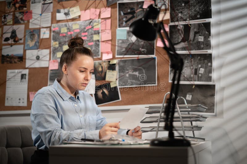 Female Detective Working in Her Office, Processing Evidence Stock Image ...