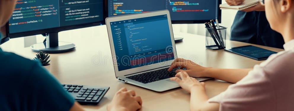 Female Developer Coding on Laptop while Computer Display Program. Burgeoning. Stock Image ...