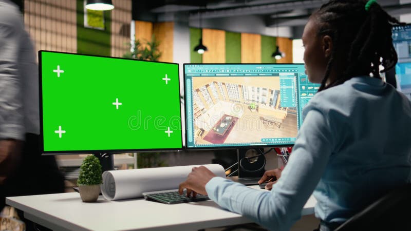 Female Developer Works on Floor Plan Design with a Chroma Key Screen ...