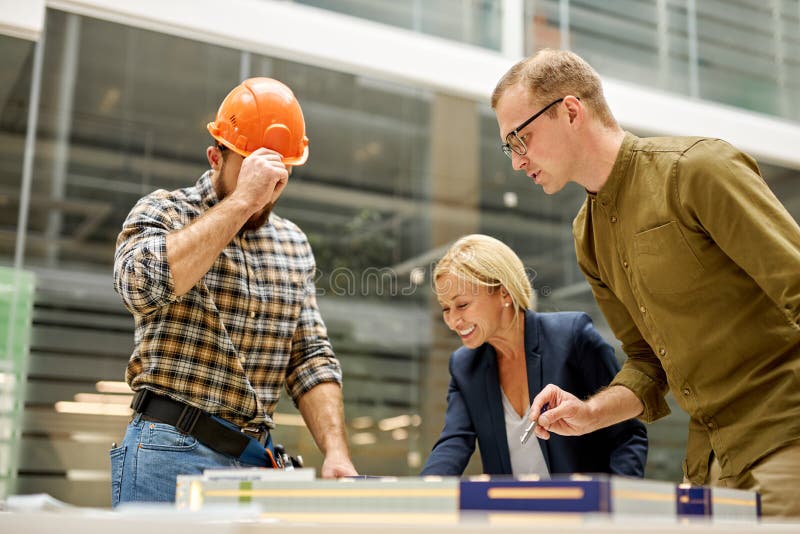 Female Director Supervising the Process of Work by Architect Stock ...