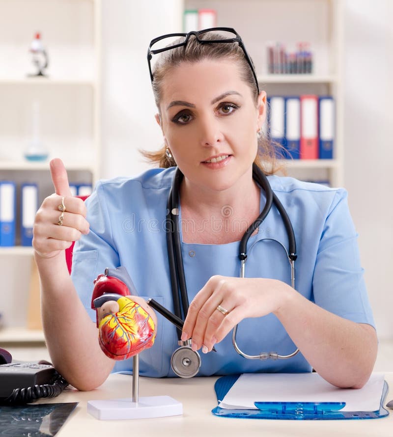 Female Doctor Cardiologist Working in the Clinic Stock Photo - Image of ...