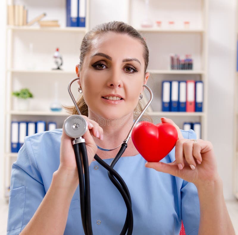 Female Doctor Cardiologist Working in the Clinic Stock Photo - Image of ...