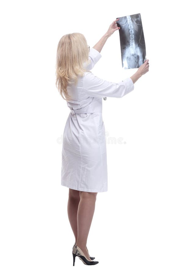 Female Doctor Carefully Looking at the X-ray. Isolated on a White Stock ...