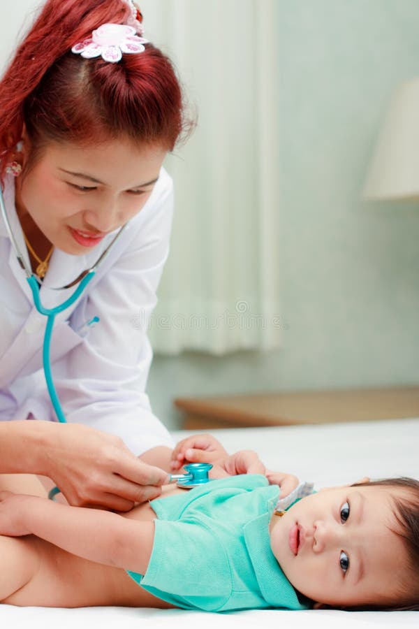 Female Doctor Checking Baby Petient Stock Photo - Image of infant ...