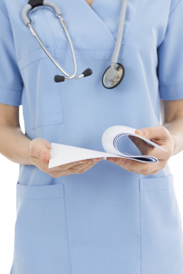Female Doctor Checking Notes Stock Image - Image of notes, female: 50381049