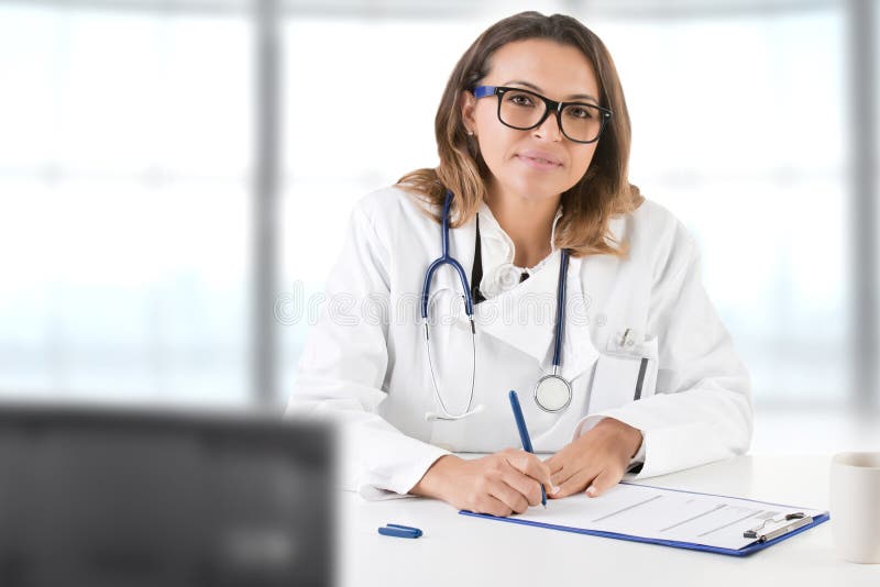 Female Doctor on the Doctors Office Stock Image - Image of hand ...