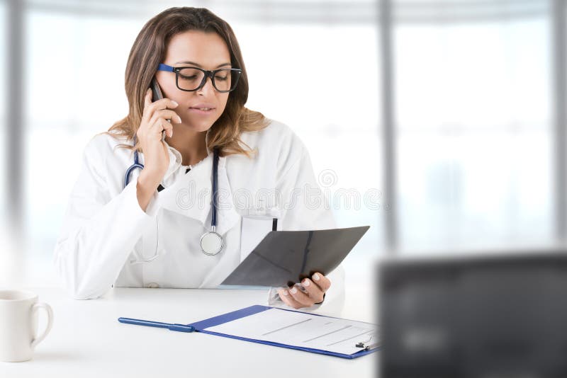 Female Doctor on the Doctors Office Stock Photo - Image of attractive ...