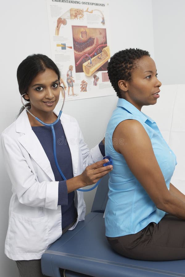 Female Doctor Doing a Medical Examination Stock Photo - Image of ...