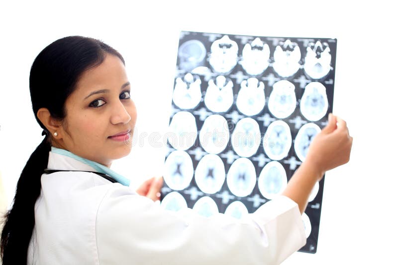 Female Doctor Examining a Brain Tomography Scan Stock Photo - Image of ...