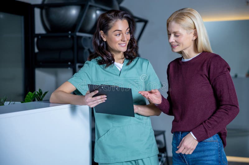 Female Doctor Explaining To the Patient Diagnostics Results Stock Photo ...