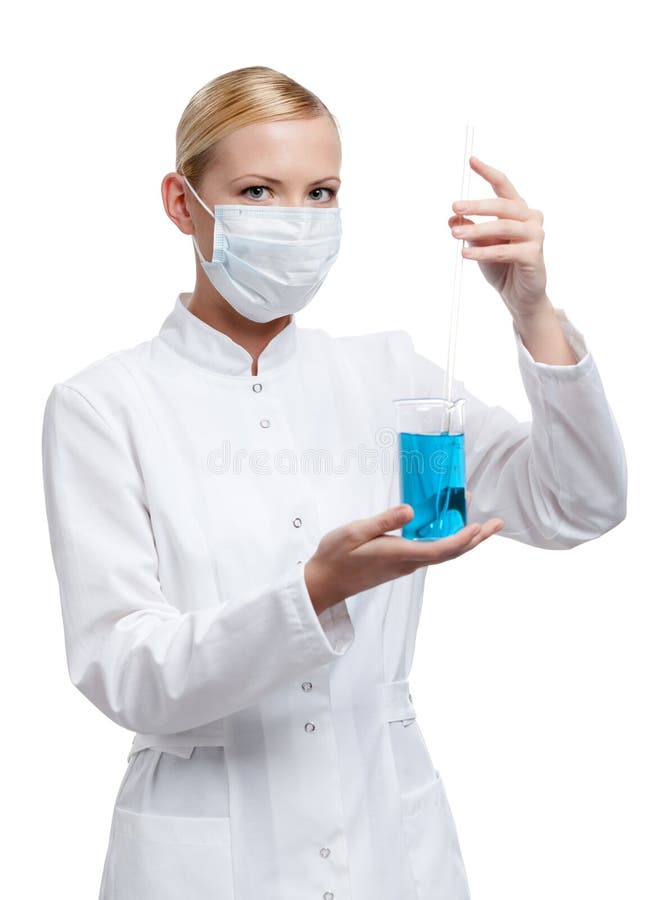 Glass Beaker Cylinder and Flask with Orange Solution in Chemistry ...