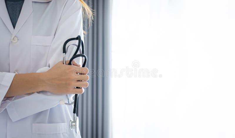 The Female Doctor Held a Stethoscope and Stood in the Ward with a ...