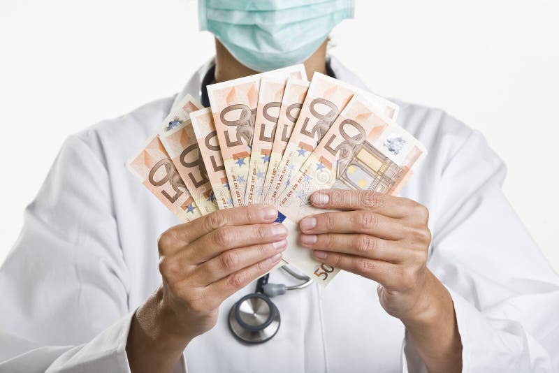 Female Doctor Holding Money Stock Photo - Image of instruments, health ...