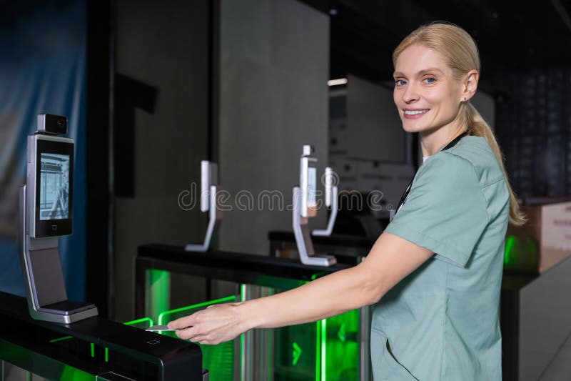 Female Doctor Lab Coat Passing Security Control Using Access Card Stock ...