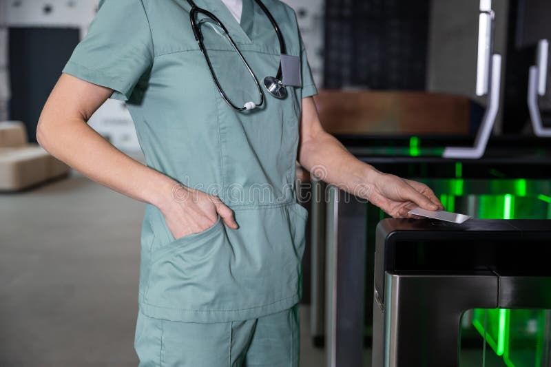 Female Doctor Lab Coat Passing Security Control Using Access Card Stock ...