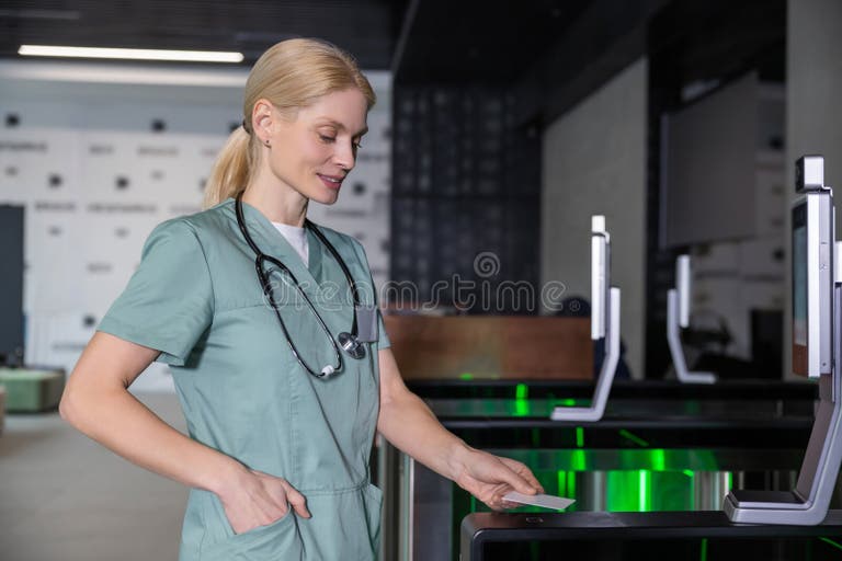 Female Doctor in Lab Coat Passing through Security Control by Using ...