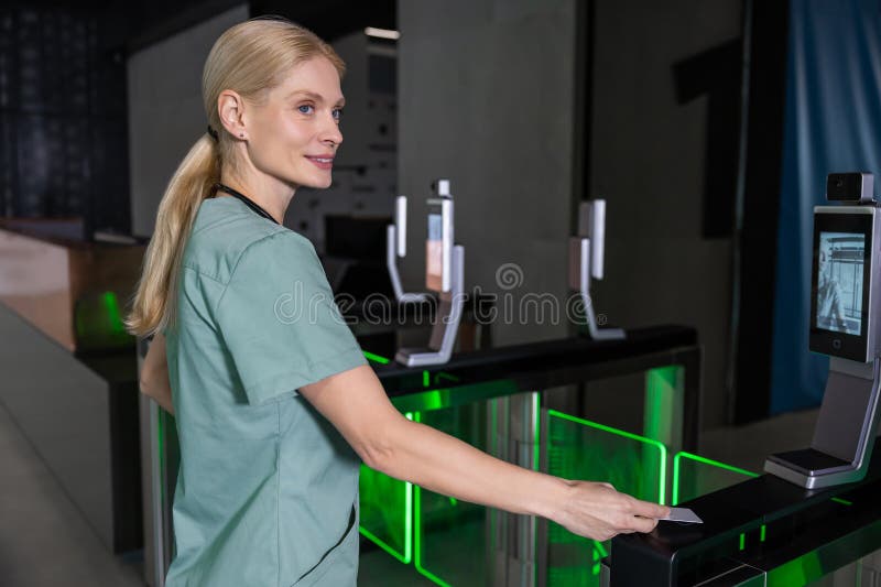Female Doctor Lab Coat Passing Security Control Using Access Card Stock ...