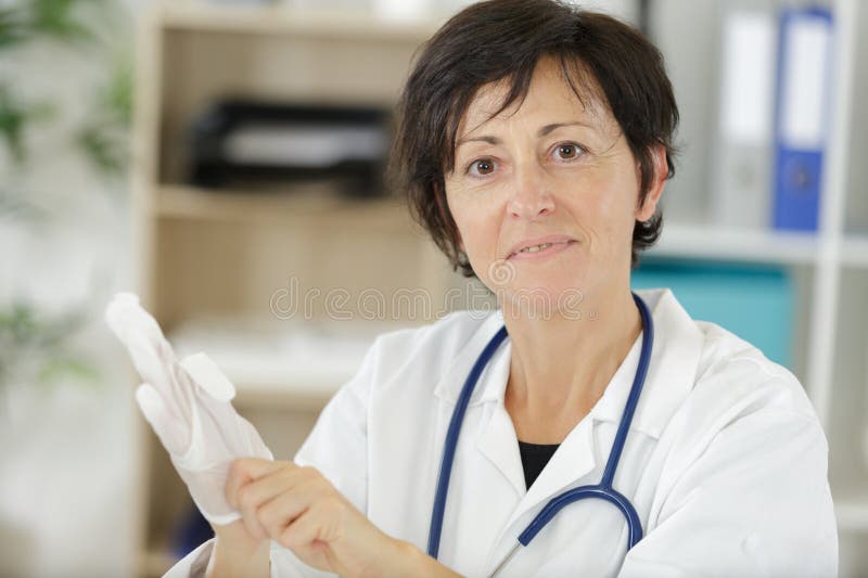 Female Doctor Looking at Camera Stock Photo - Image of equipment, medic ...