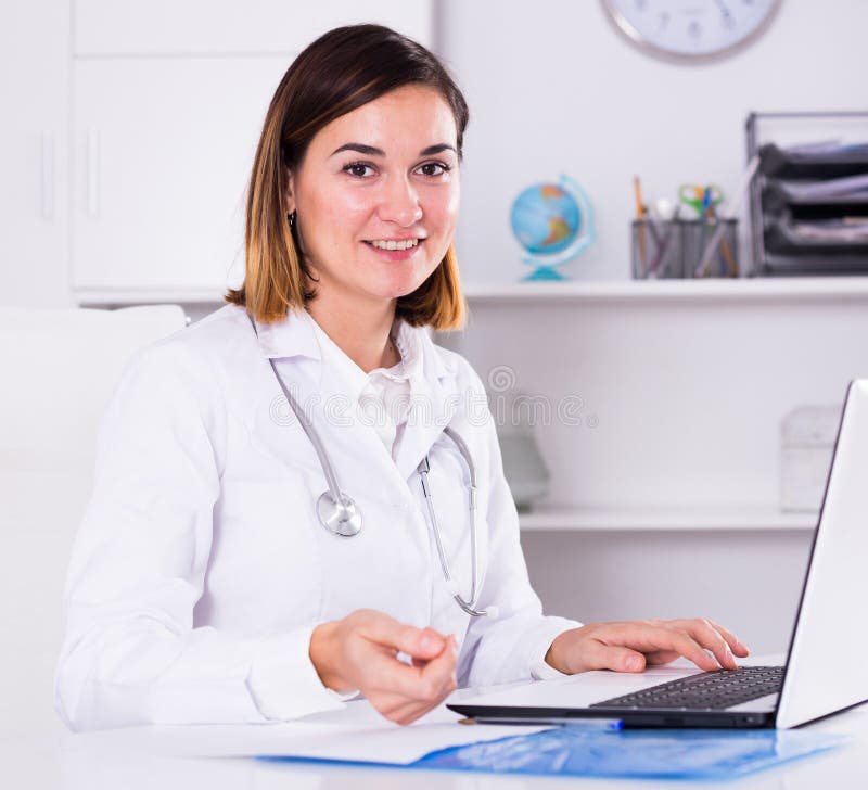 Female Doctor Offering Help Stock Image - Image of indoors, assistance ...
