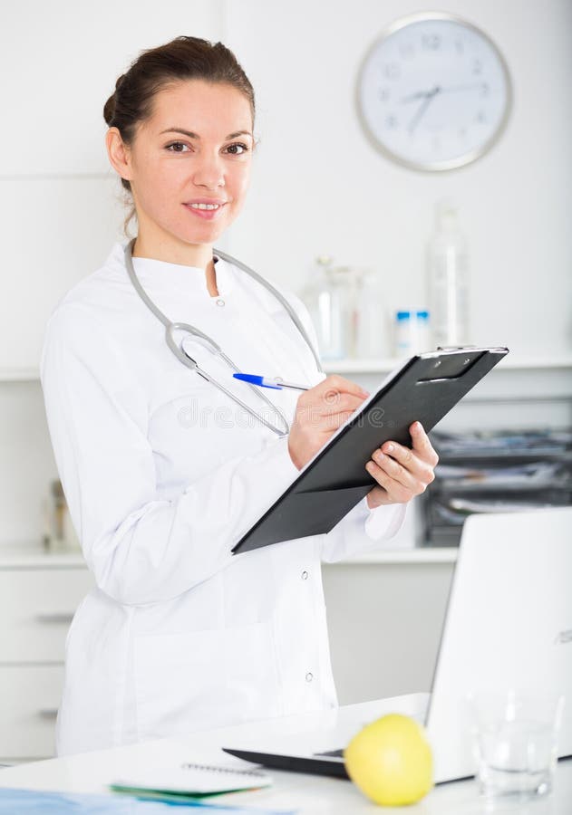 Female doctor in office stock image. Image of medicine - 270423469