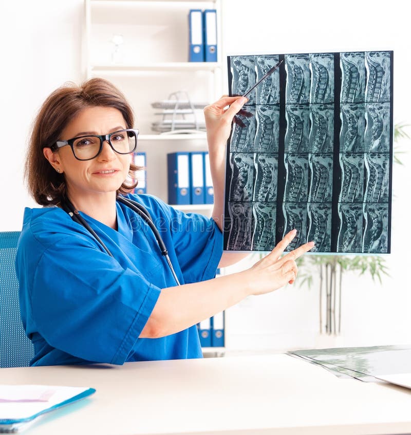 Female Doctor Radiologist Working at the Clinic Stock Photo - Image of ...