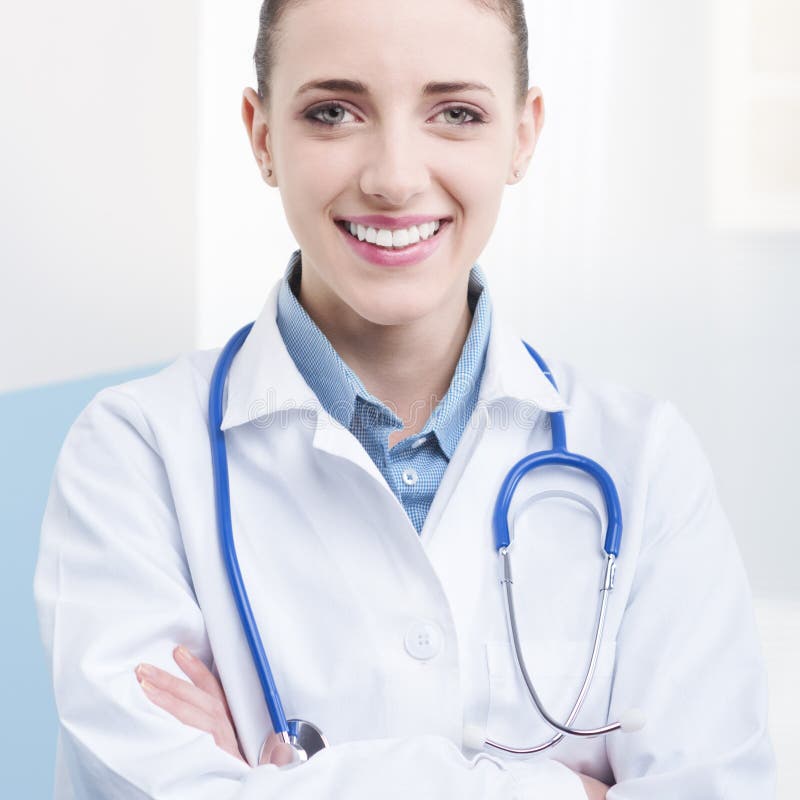Female doctor smiling stock image. Image of smiling, coat - 46633601