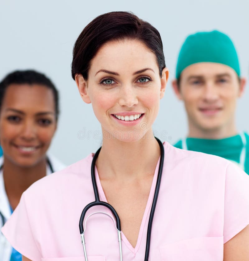 Female Doctor Standing in Front of Her Team Stock Image - Image of ...