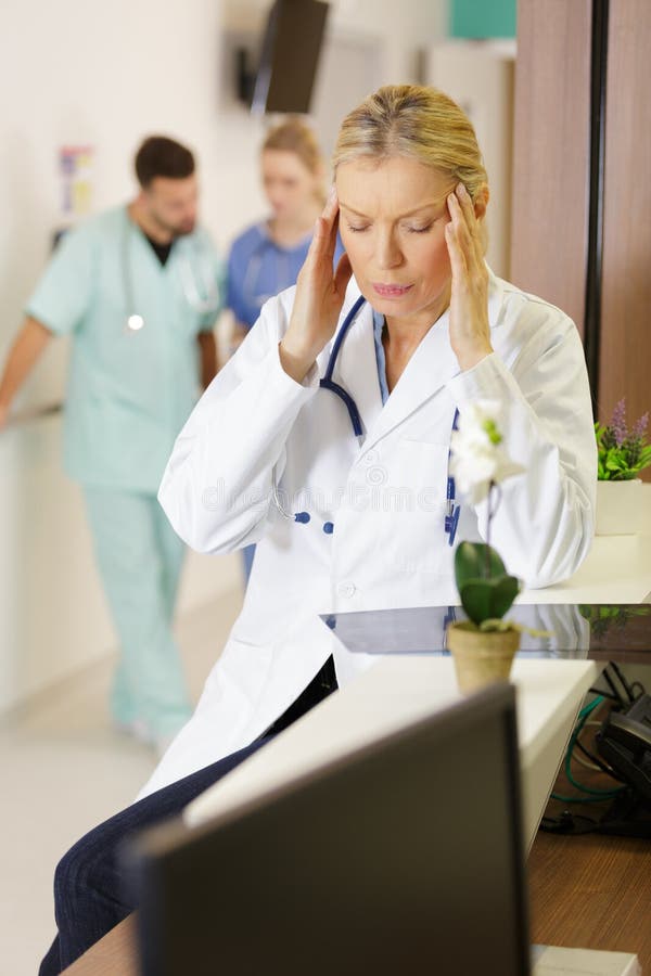 Female Doctor Suffering from Headache Stock Image - Image of sensitive ...