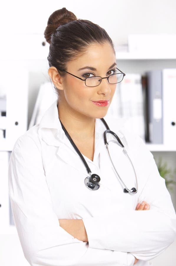 Female doctor in surgery stock image. Image of kind, clipboard - 7291977