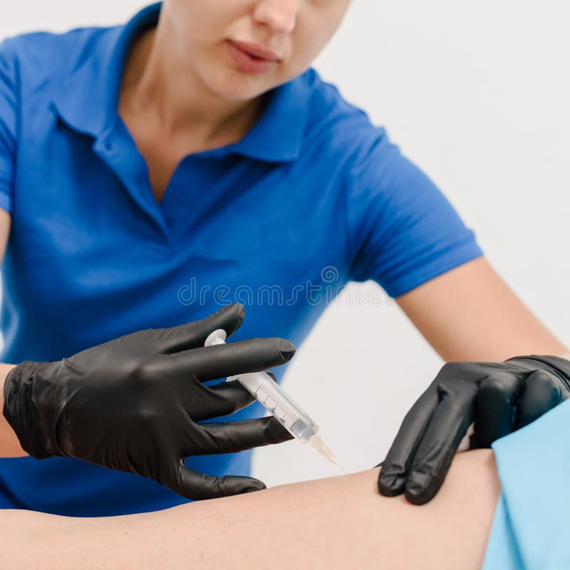 Syringe injection in back stock photo. Image of anesthesia - 132710596