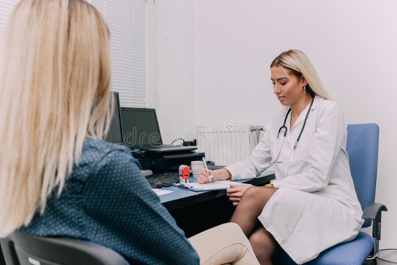 Female Doctor Talking To Patient Stock Photo - Image of complaints ...