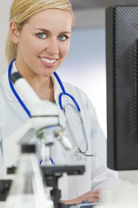 Female Doctor Using Computer in Laboratory Stock Image - Image of ...