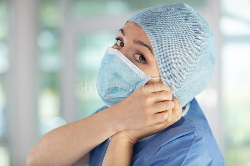 Female doctor using mask stock image. Image of analysis - 261512741