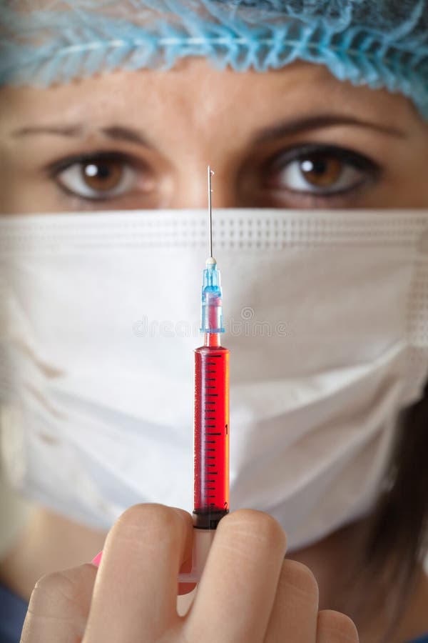 Female Doctor Using a Syringe Stock Photo - Image of glove, copy: 21777114
