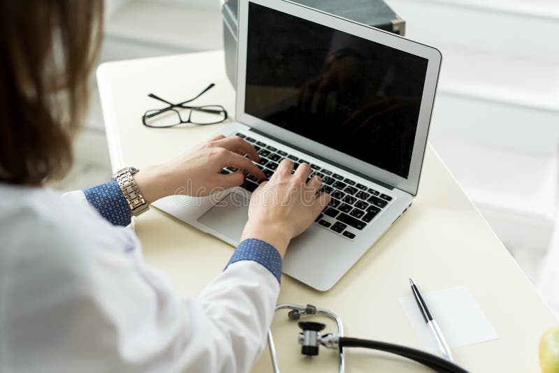 Female Doctor at Work in Clinic Office. Stock Image - Image of people ...