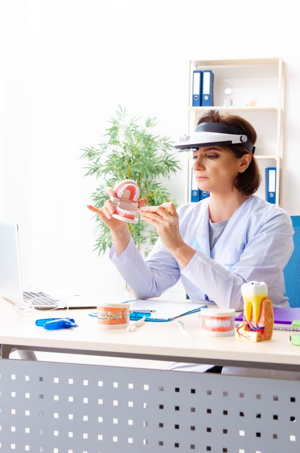 The Female Doctor Working on New Teeth Implant Stock Photo - Image of ...