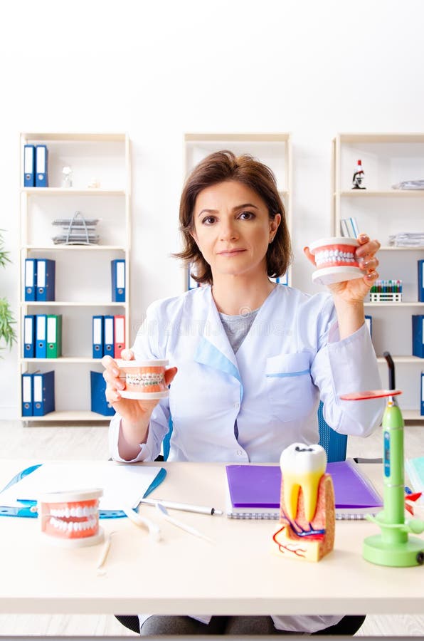 The Female Doctor Working on New Teeth Implant Stock Image - Image of ...