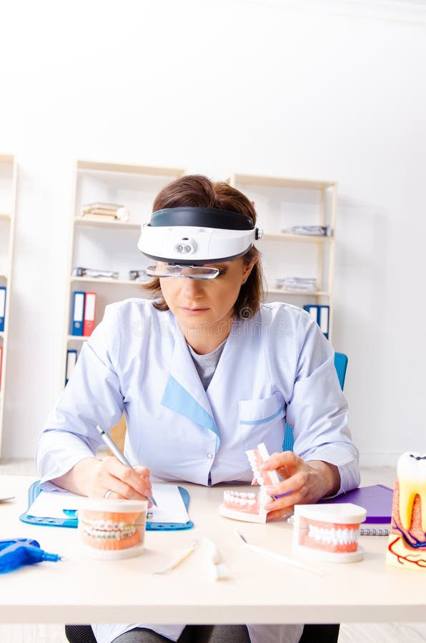 The Female Doctor Working on New Teeth Implant Stock Image - Image of ...
