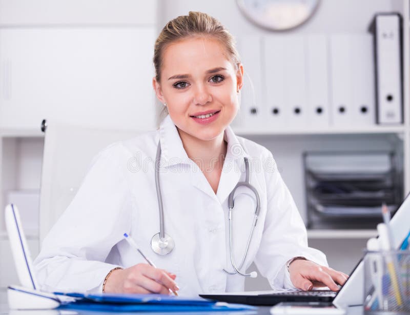 Doctor working effectively stock photo. Image of desk - 85719396