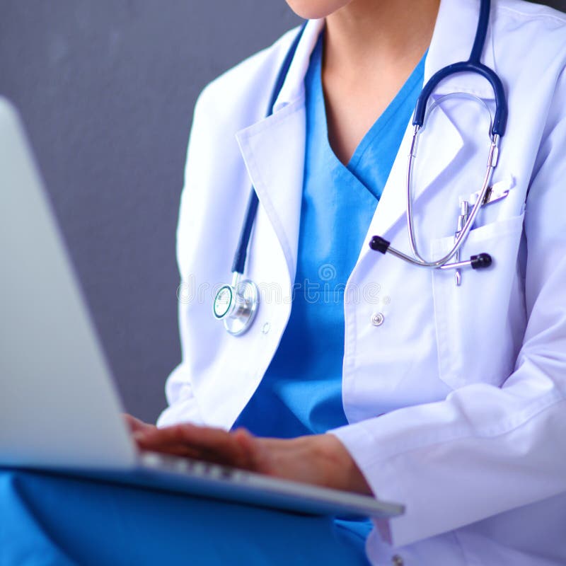 Female Doctor Working Sitting on Gray Background Stock Image - Image of ...